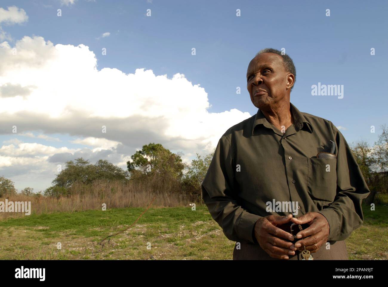 The Rev. Louis Adams stands at the empty lot in the Lower Ninth Ward in ...