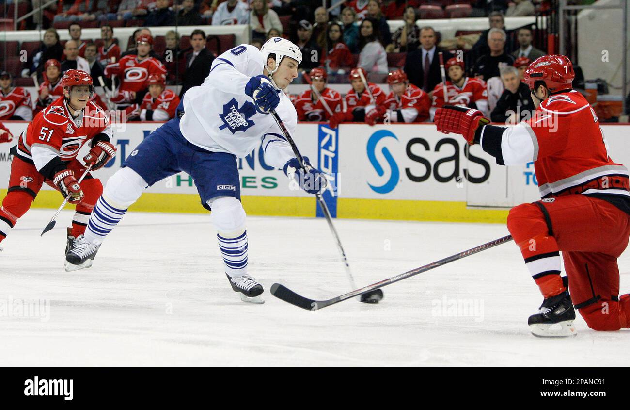 Toronto Maple Leafs' Alex Steen, center, shoots as Carolina Hurricanes ...