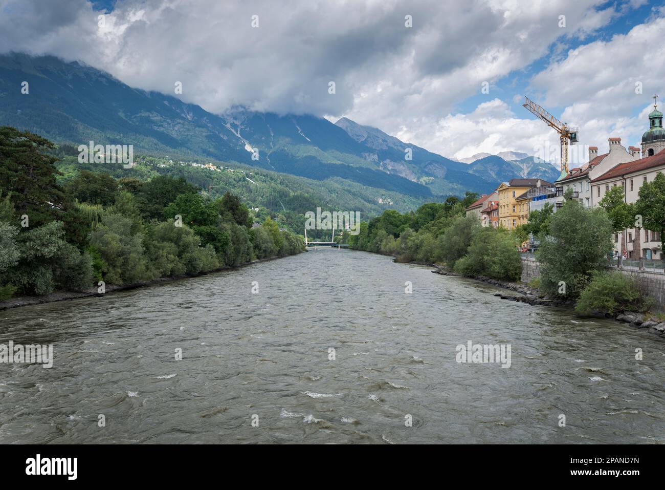 Views of the River Inn from the Innbrücke bridge, in Innsbruck, Austria ...