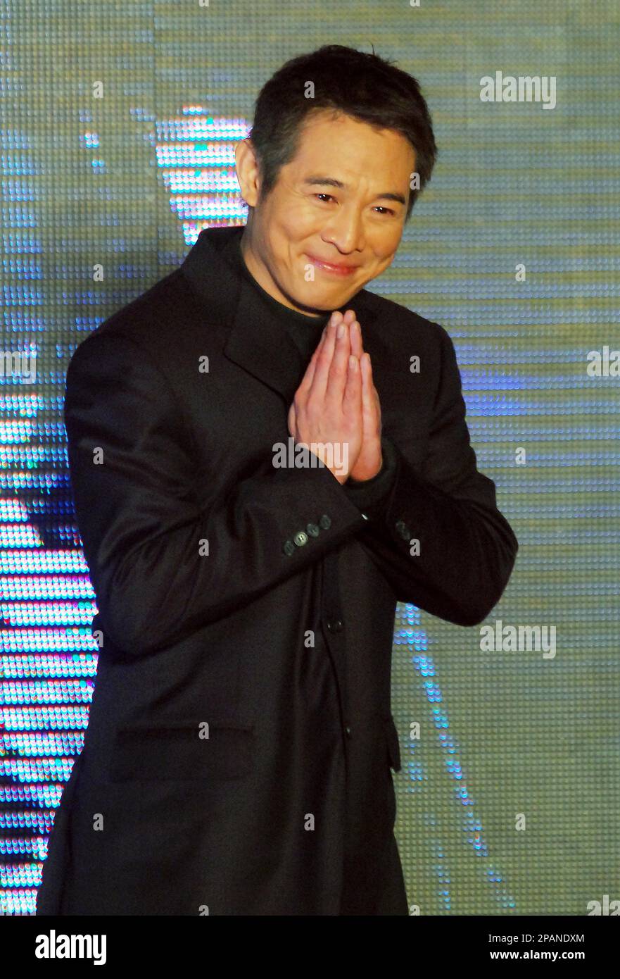 Chinese actor Jet Li poses for media during a news event to promotes ...