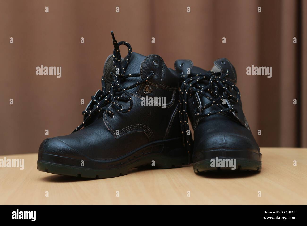 Detailed photo of a pair of safety shoes for work. Work protective ...