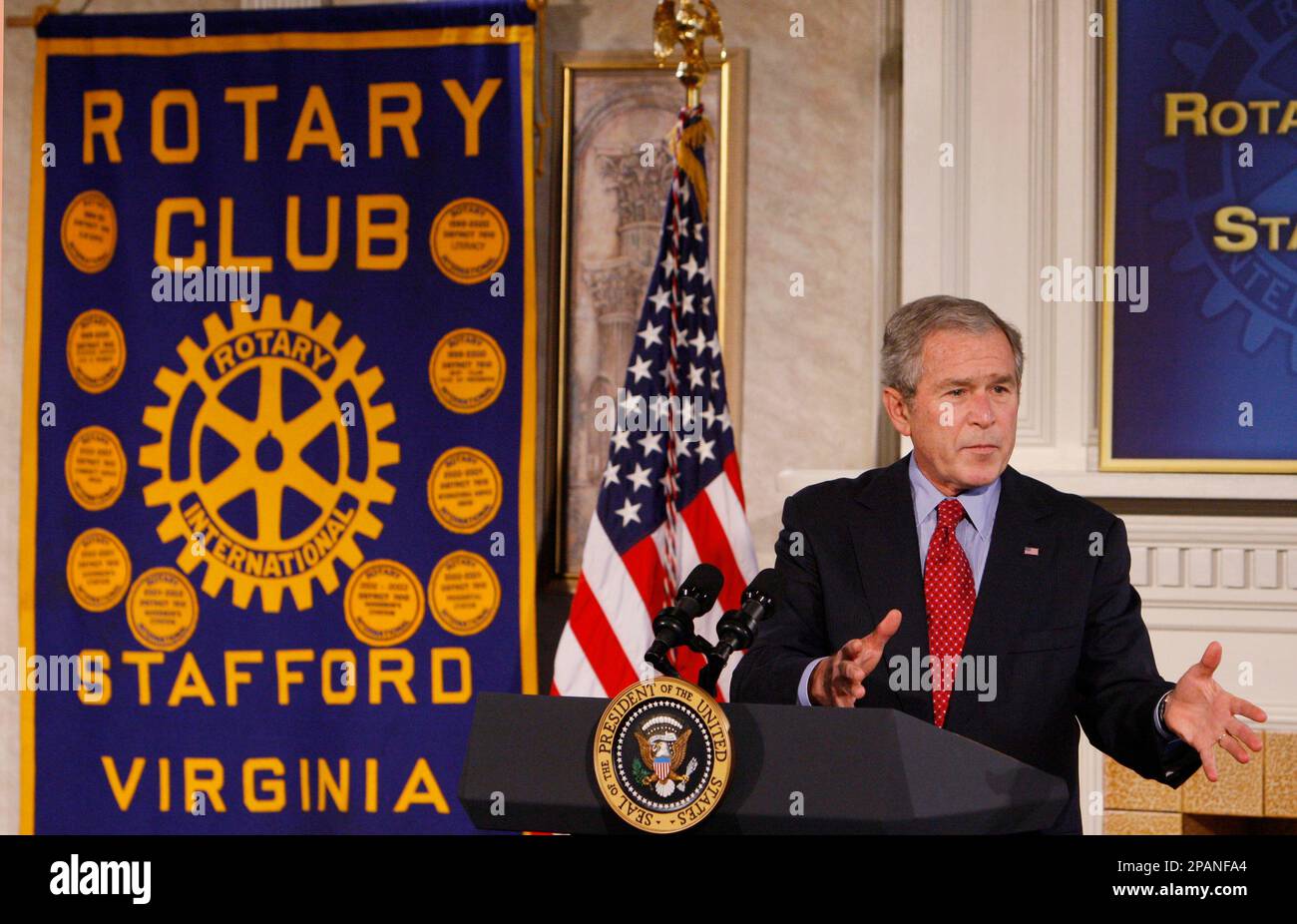 President Bush speaks about the economy at a Rotary Club meeting ...