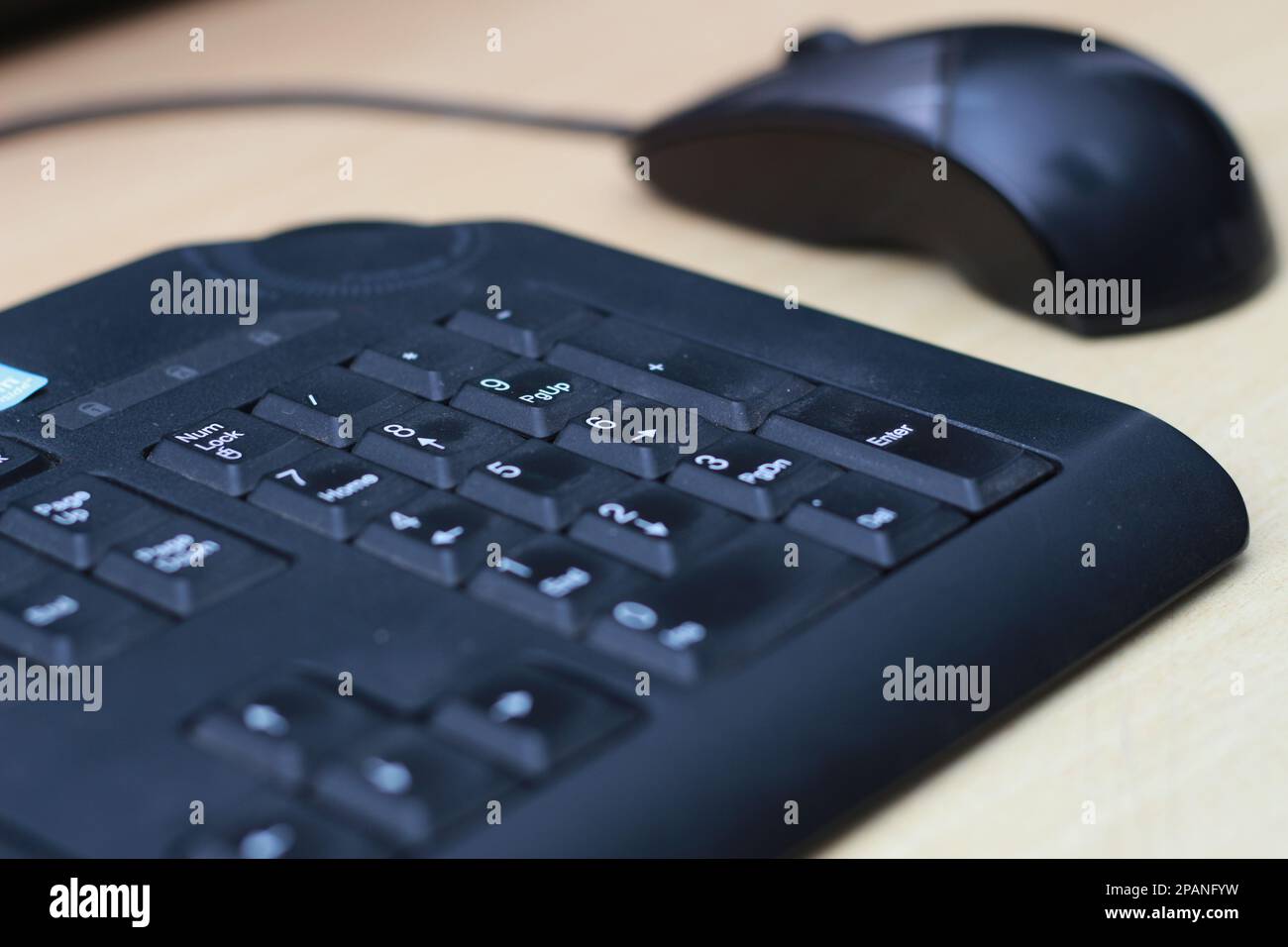 a photo of a black mouse and keyboard to work with. Technology ...