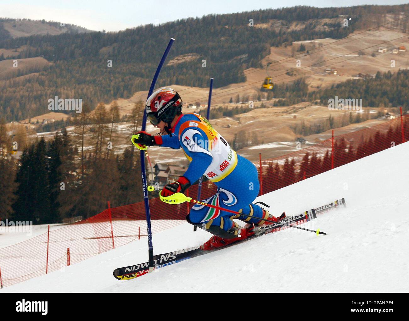 Italy's Giorgio Rocca clears a gate in the first run in the World Cup ...