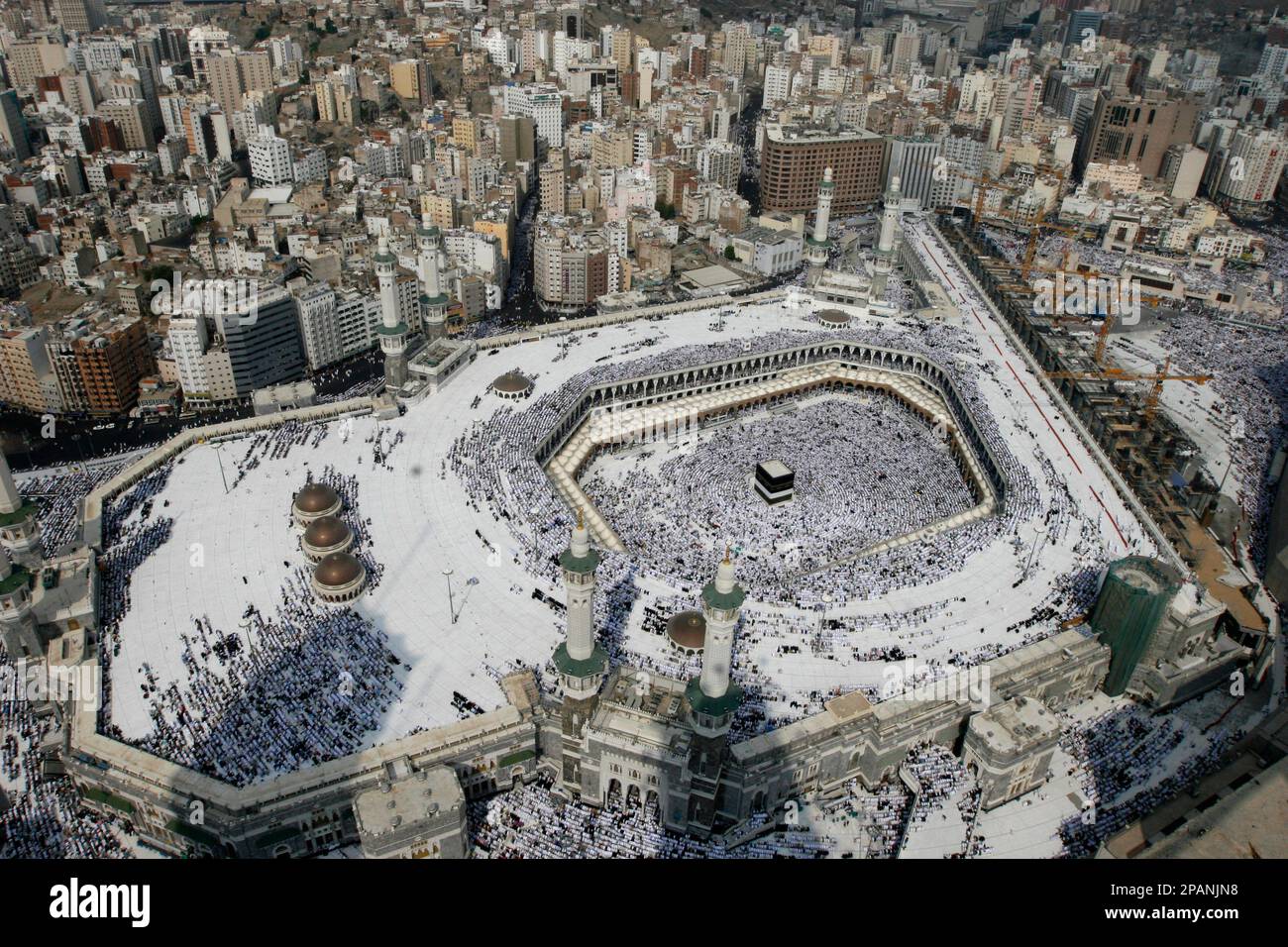 Muslims perform noon prayers around the holy Kaaba inside the Grand ...