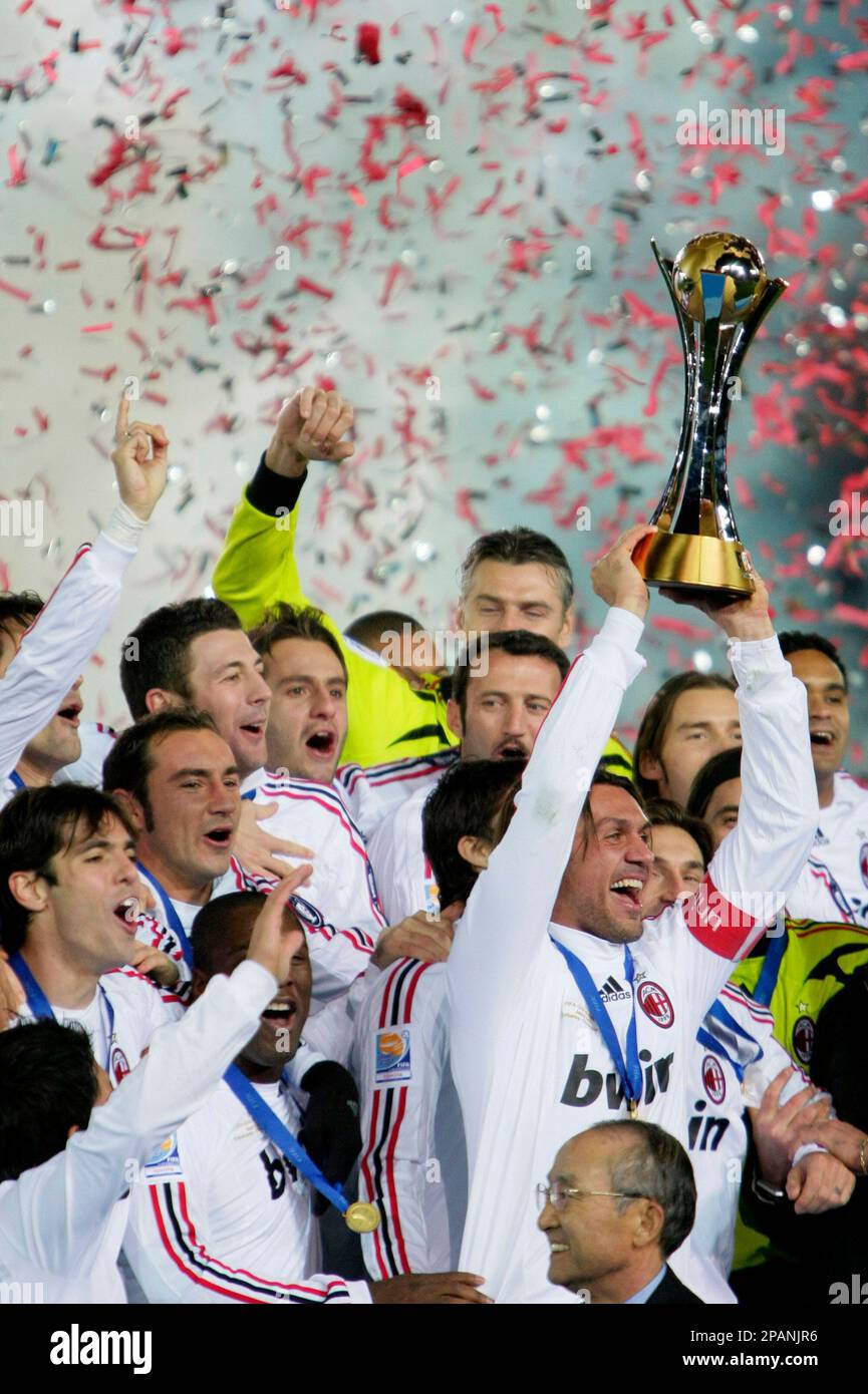 AC Milan's Paolo Maldini raises the trophy aloft as the European ...
