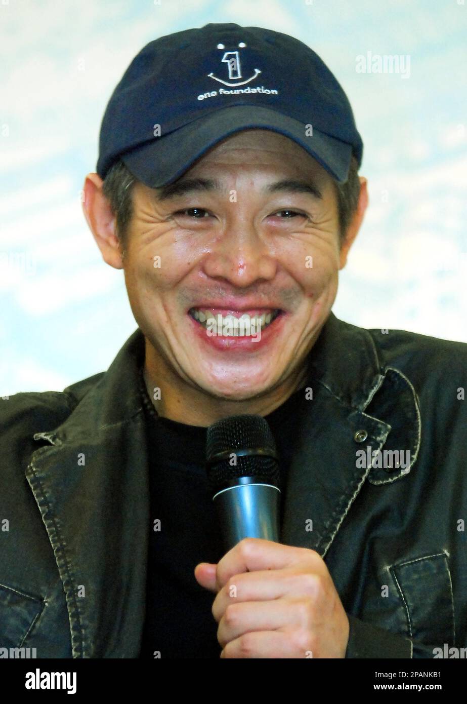 Chinese actor Jet Li smiles during a news conference as he promotes his ...
