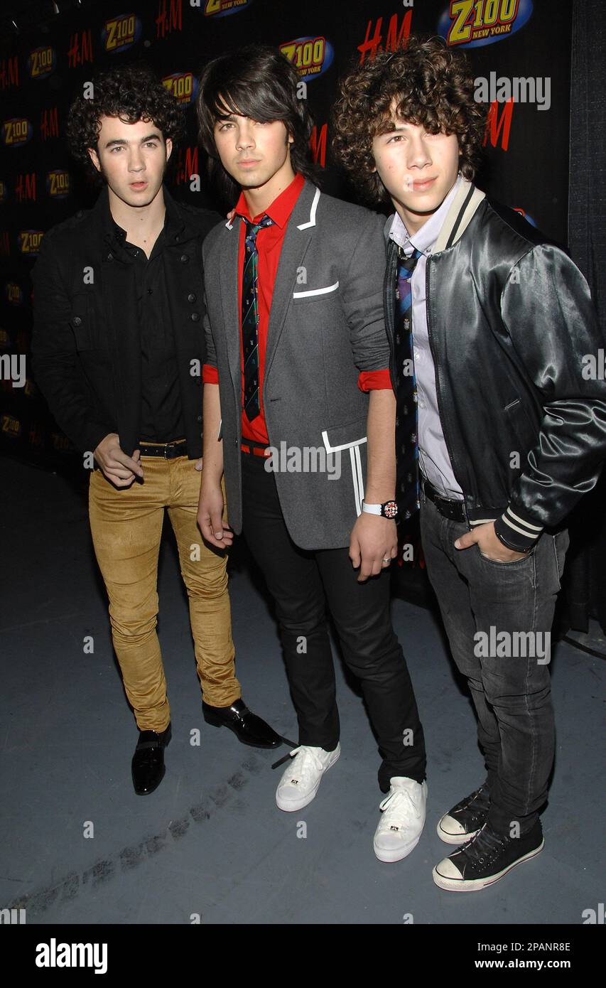 The Jonas Brothers from left, Kevin, Joe and Nick poses in the press ...