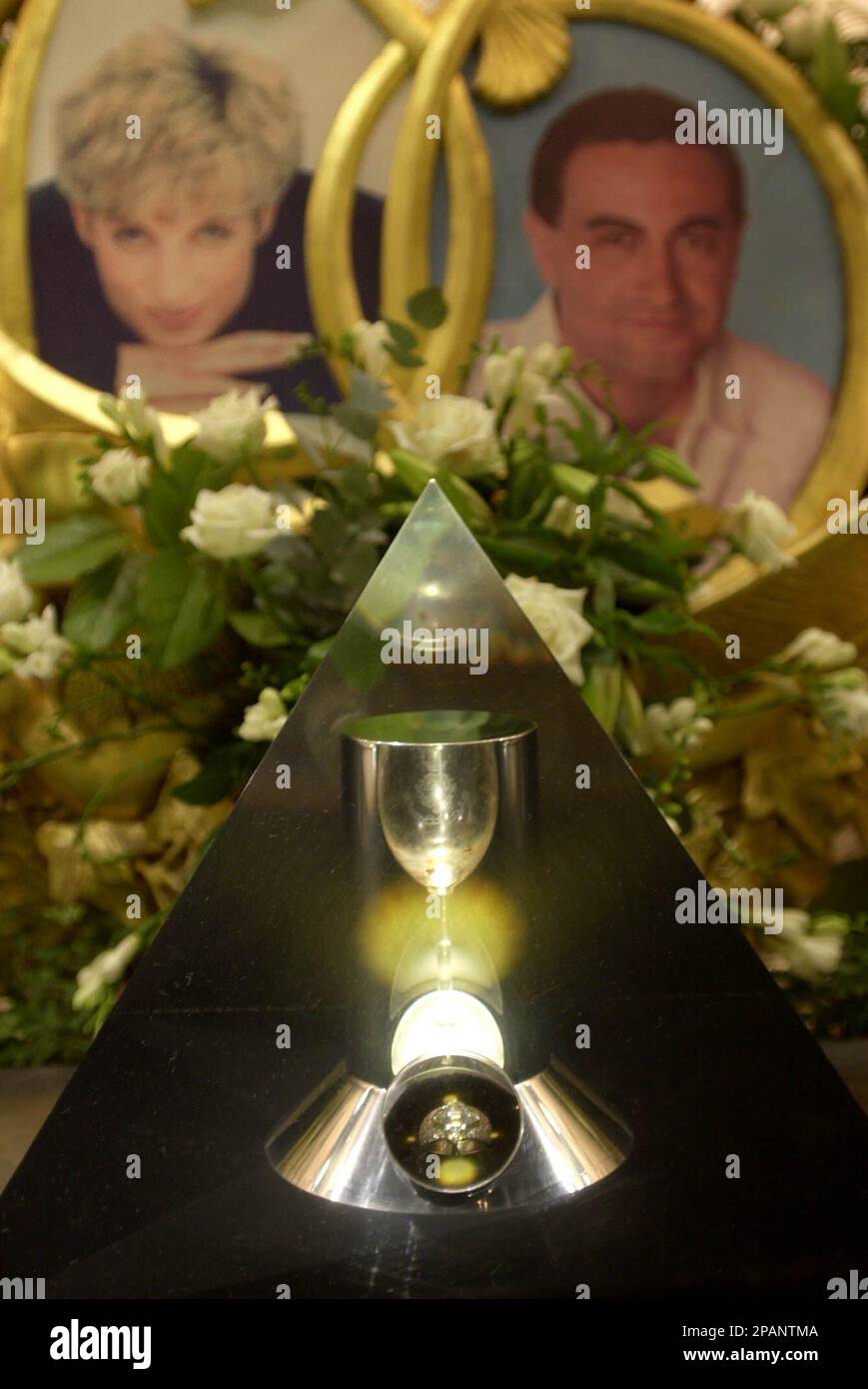 **FILE**A wine glass from the couple's last evening together, and an ...