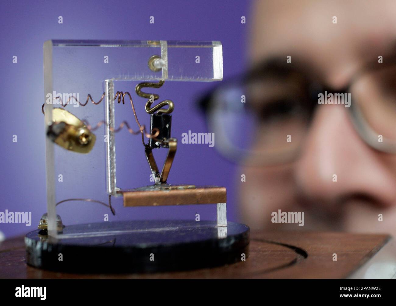 Computer History Museum senior curator Dag Spicer looks at a replica of ...