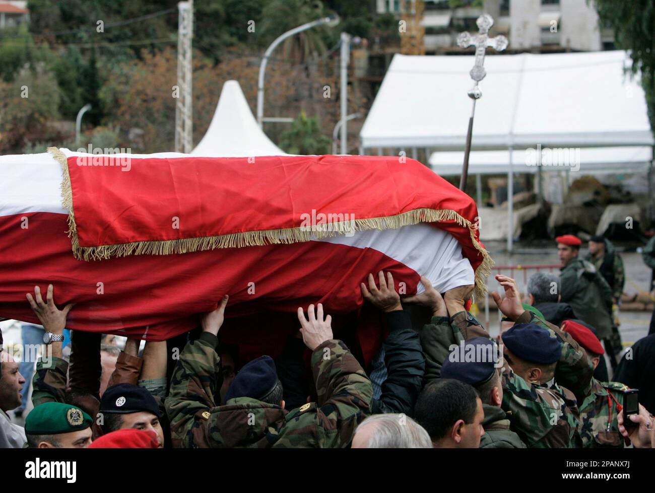 Lebanese citizens, carry the coffin of salin Maj. Gen. Francois Hajj ...