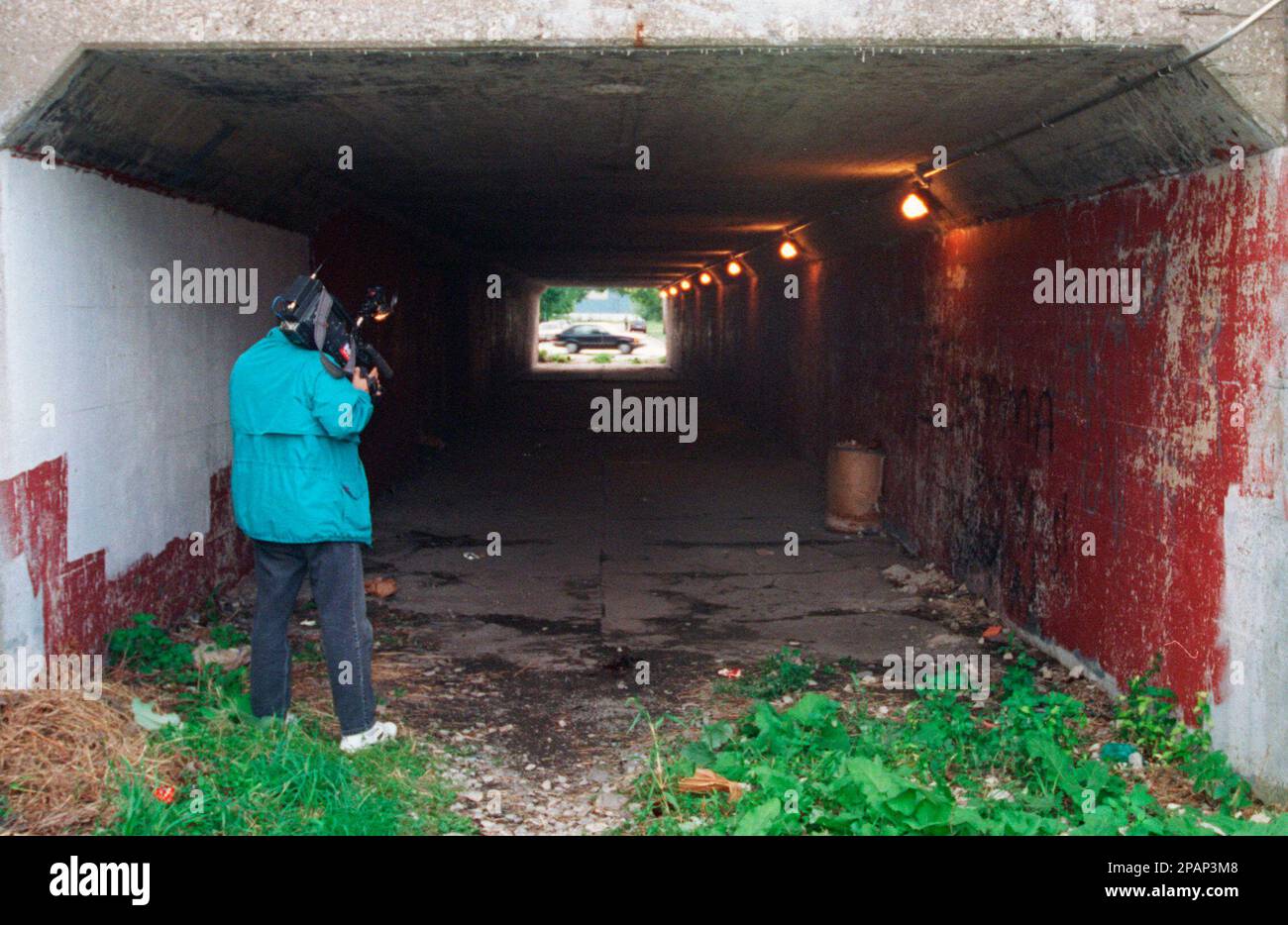 **ADVANCE FOR TUESDAY, DEC. 18** **FILE** A cameraman photographs the ...