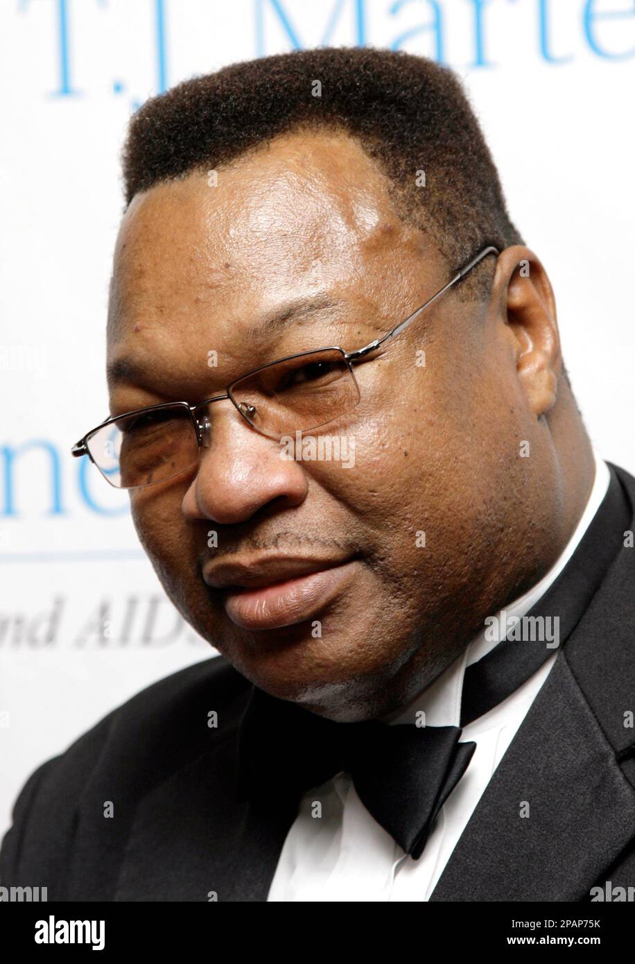 ** FILE ** Former heavyweight boxing champion Larry Holmes arrives at ...
