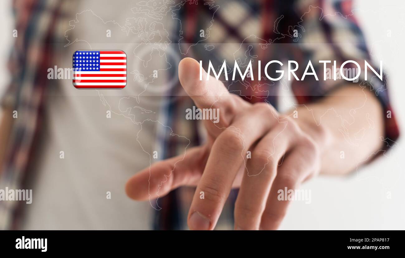 Man pointing at word IMMIGRATION and world map on dark blue background ...