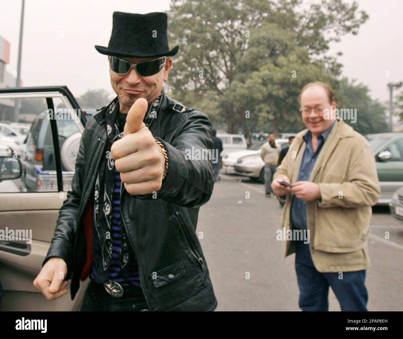 Lead singer Klaus Meine, left, of the rock band Scorpions poses for a ...