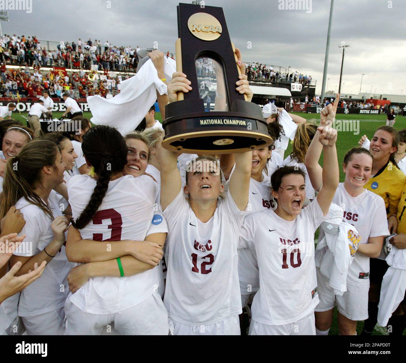 Southern California's Alyssa Davila (3), Amy Rodriguez (12) and Stacey ...