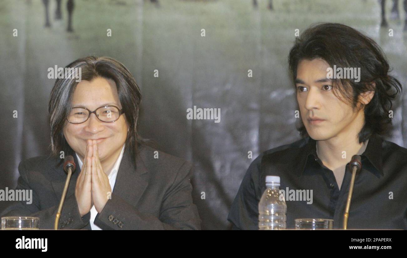 Hong Kong movie directer Peter Chan, left, greets in Thai way as ...
