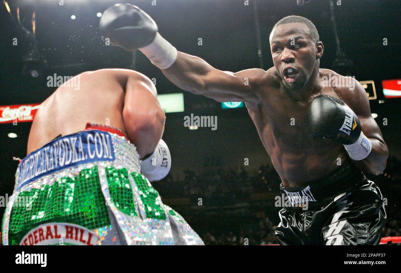 Jeff Lacy, right, misses a punch thrown at Peter Manfredo Jr. during ...