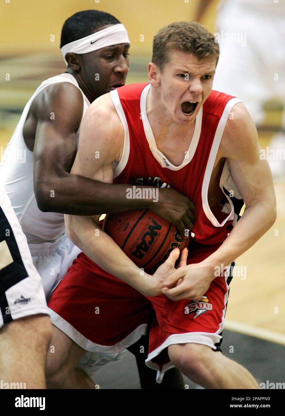 Southern Utah guard Mike Marek, right, is tied up by Oakland guard ...