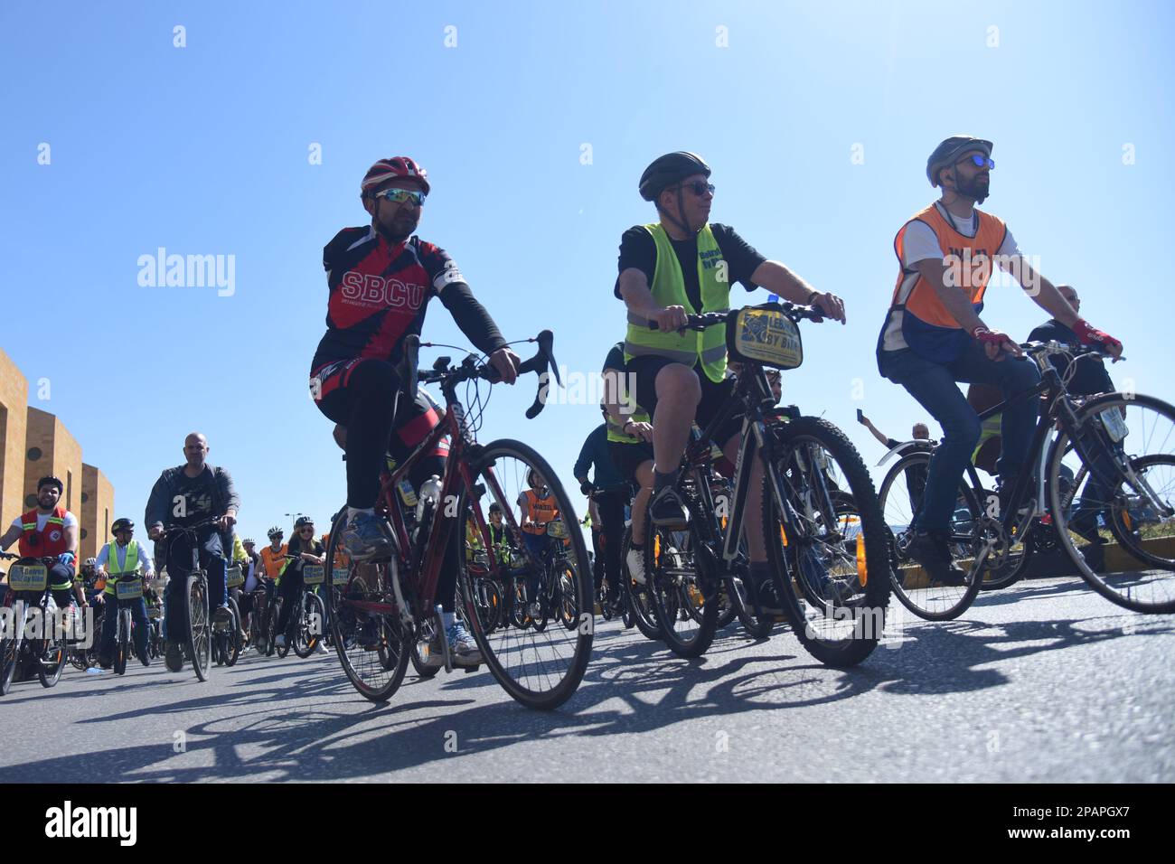 Tripoli, Lebanon. 11th Mar, 2023. Cyclists participate in a riding ...