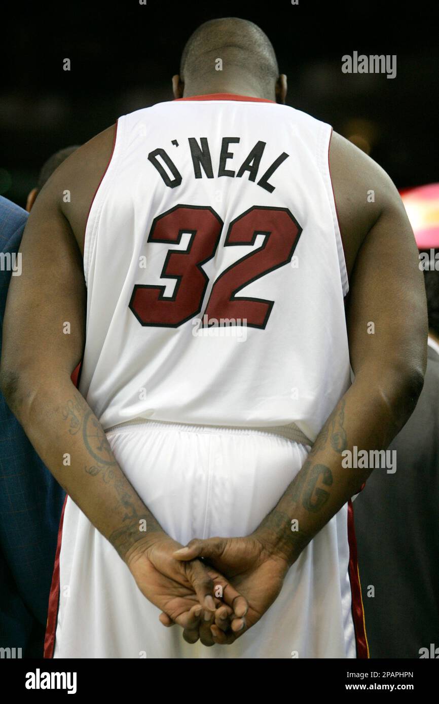 Miami Heat's Shaquille O'Neal listens during a time out against the ...