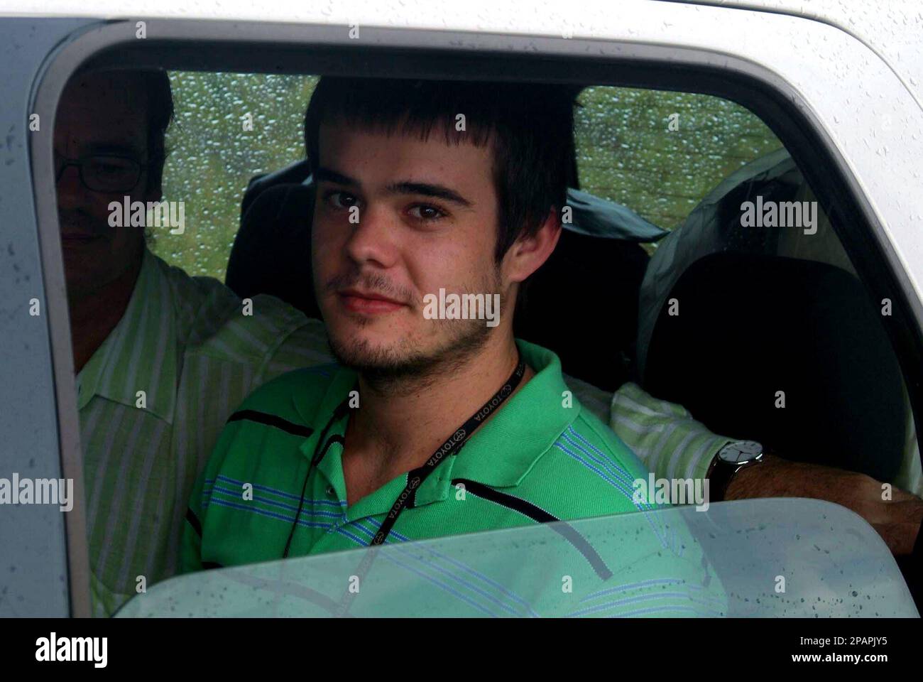 Joran van der Sloot, right, sits in a car with his father, Paulus Van ...