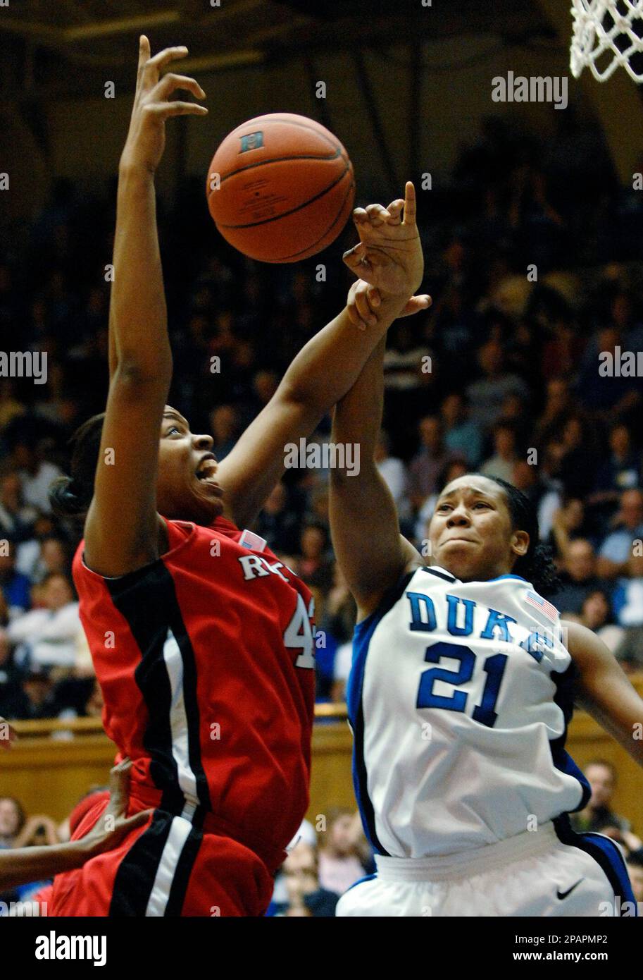 Rutgers' Rashidat Junaid, left, is fouled by Duke's Joy Cheek (21) in ...