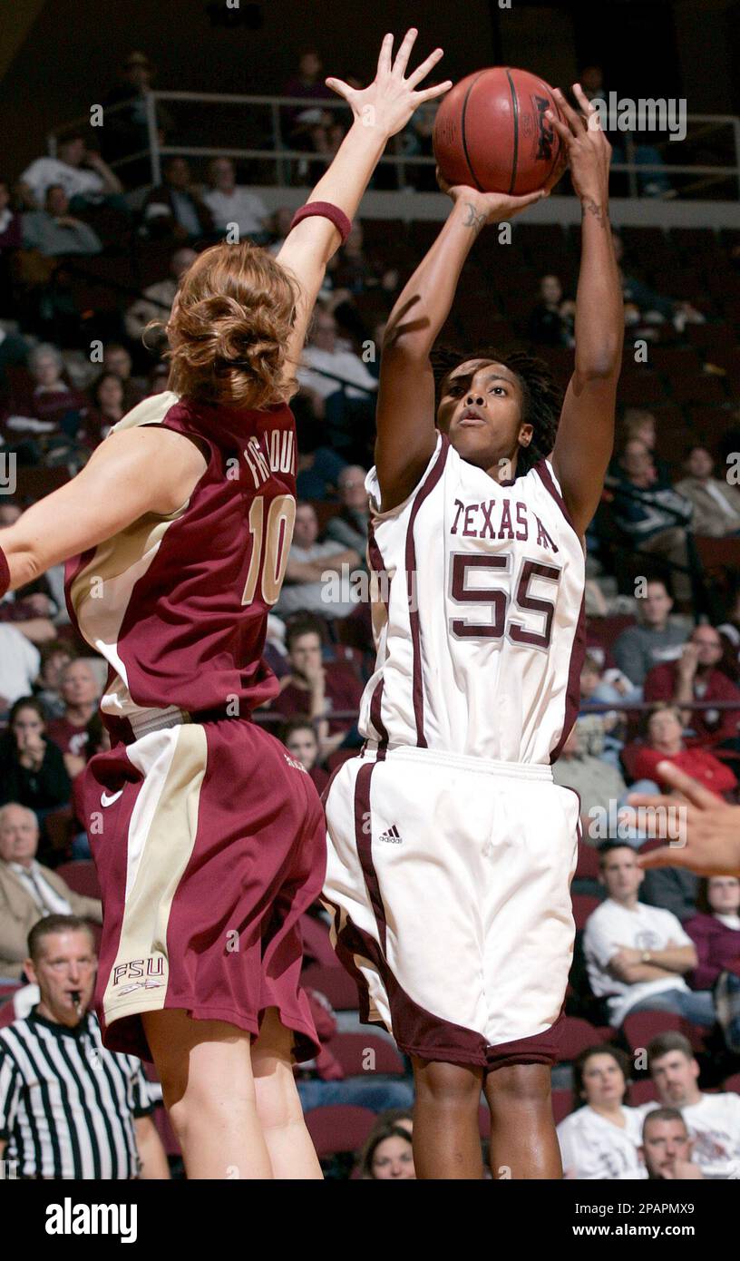Texas A&M's Danielle Gant(55) shoots over Florida State's Mara Freshour ...