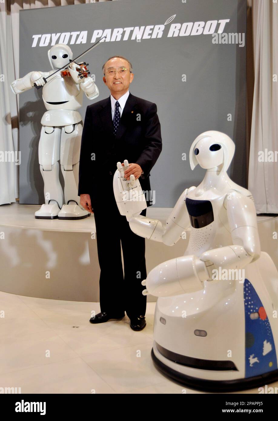 Toyota Motor Corp. President Katsuaki Watanabe stands with the Japanese ...