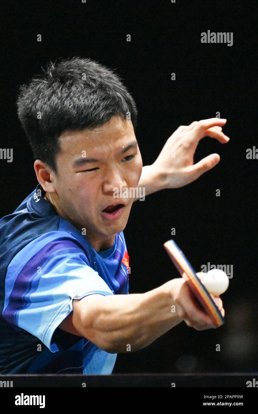 Singapore. 12th Mar, 2023. Xiang Peng of China hits a return during the ...