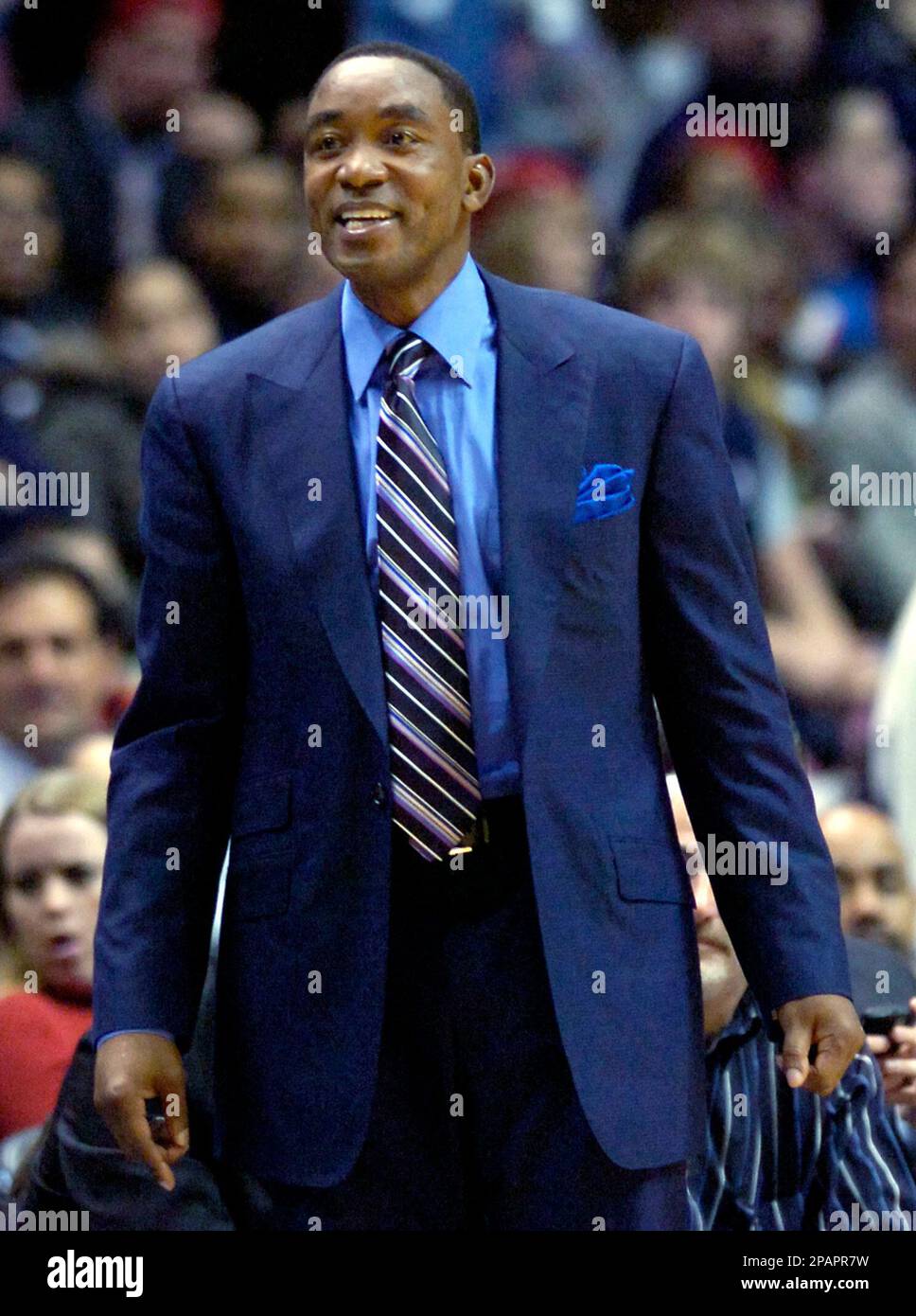 New York Knicks coach Isiah Thomas smiles during the fourth quarter of ...