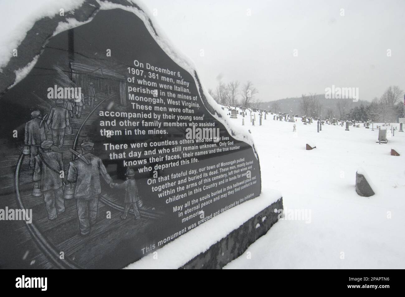 A new new black granite monument rests in the Mount Calvary Cemetery in ...