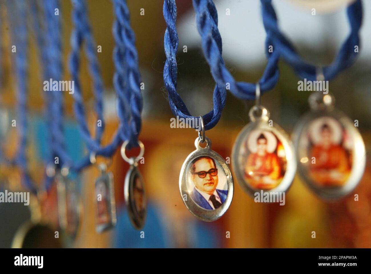 Necklaces with lockets bearing the portrait of Bhim Rao Ambedkar, are ...