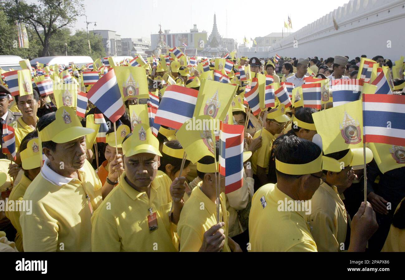 Holding national and royal flags, Thai people gather outside the Grand ...