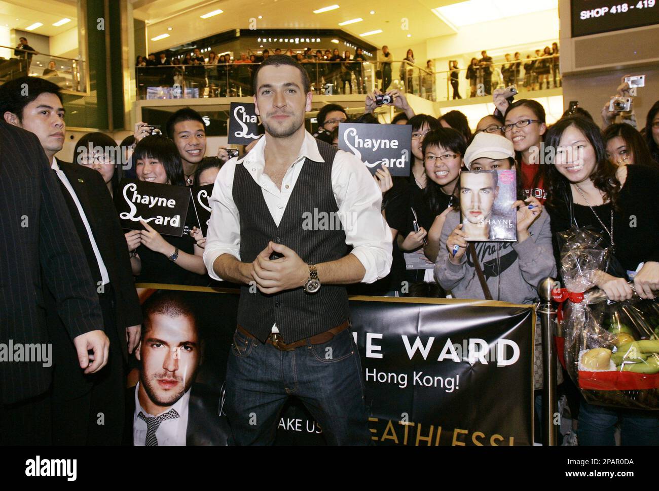 British singer Shayne Ward poses with his fans during a Christmas ...