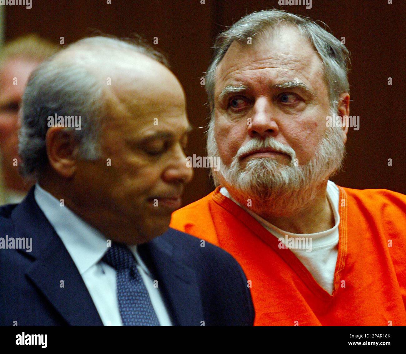 Michael Stephen Baker, right, a former Catholic priest accused of ...