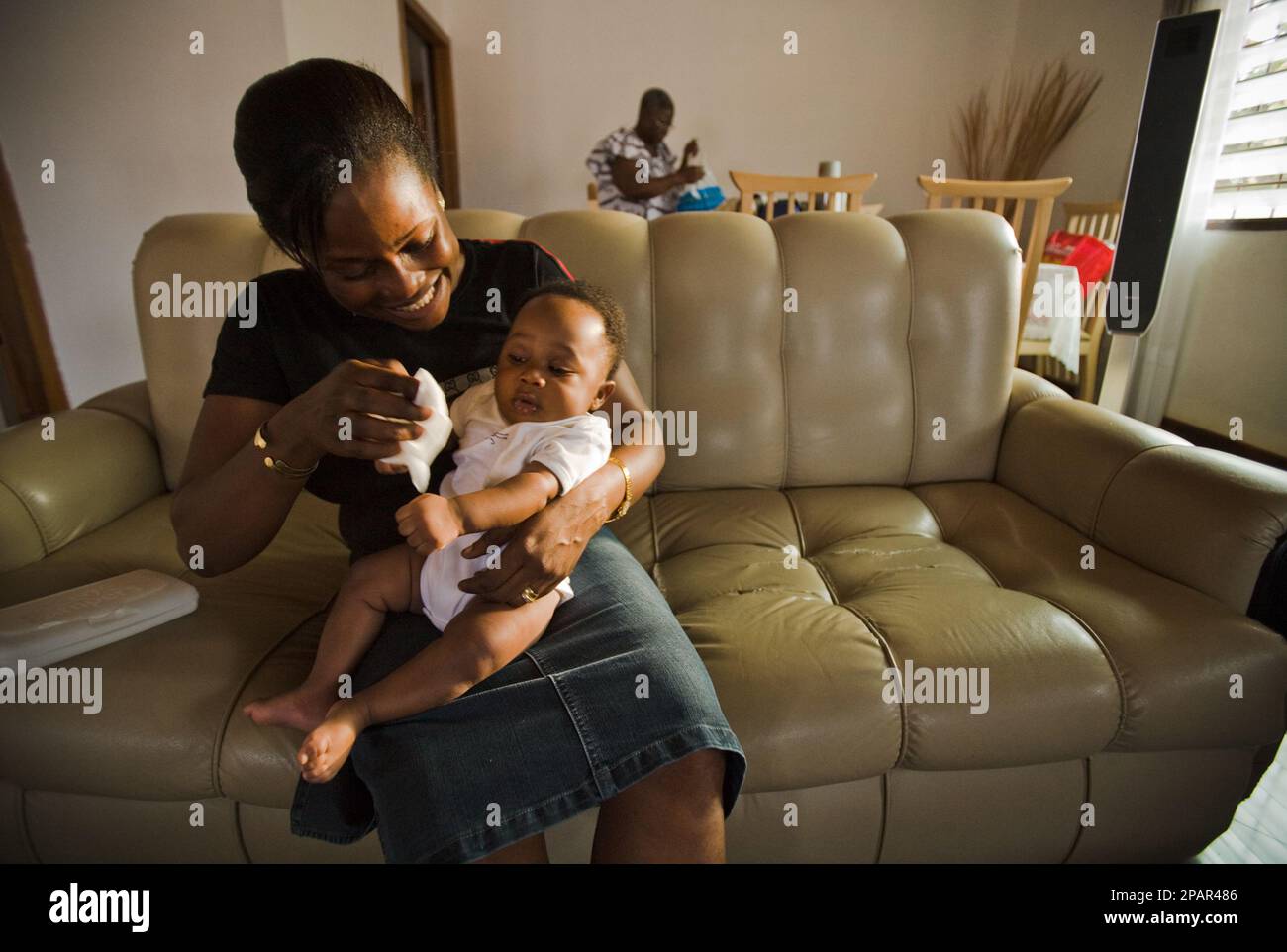 **ADVANCE FOR MONDAY, DEC. 3** Mavis Boakye takes care of her four ...