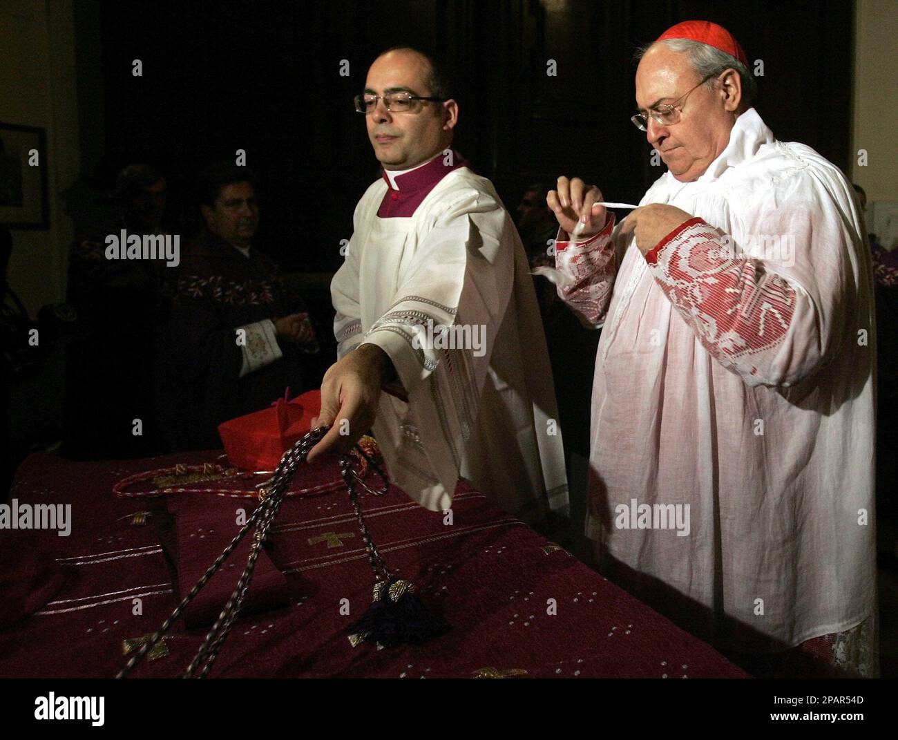 Newly appointed cardinal Leonardo Sandri of Argentina, right, attends a ...