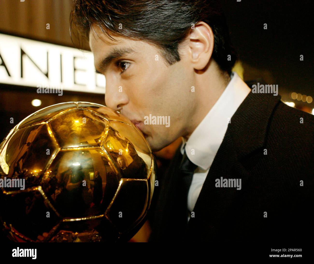 AC Milan Brazilian midfielder Ricardo Kaka kisses the Golden Ball as he ...