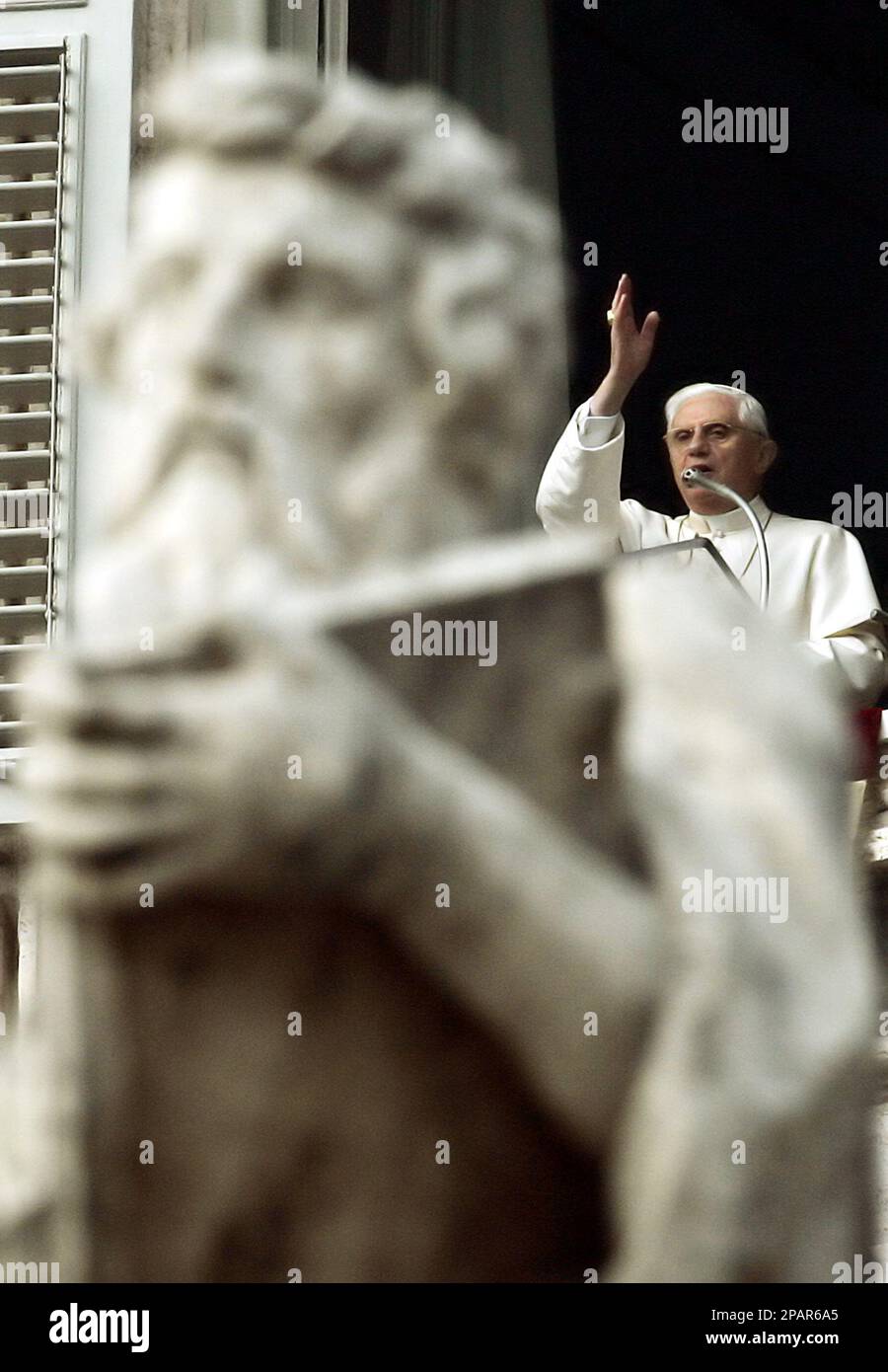 Pope Benedict XVI delivers his blessing during the Angelus prayer in St ...