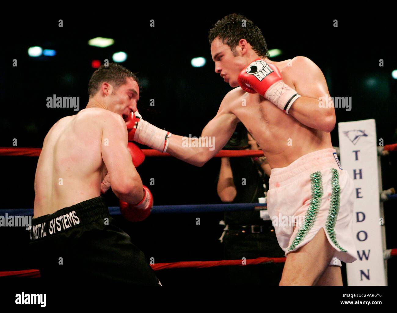 Julio Cesar Chavez, Jr, right, lands a right to the head of Ray Sanchez ...