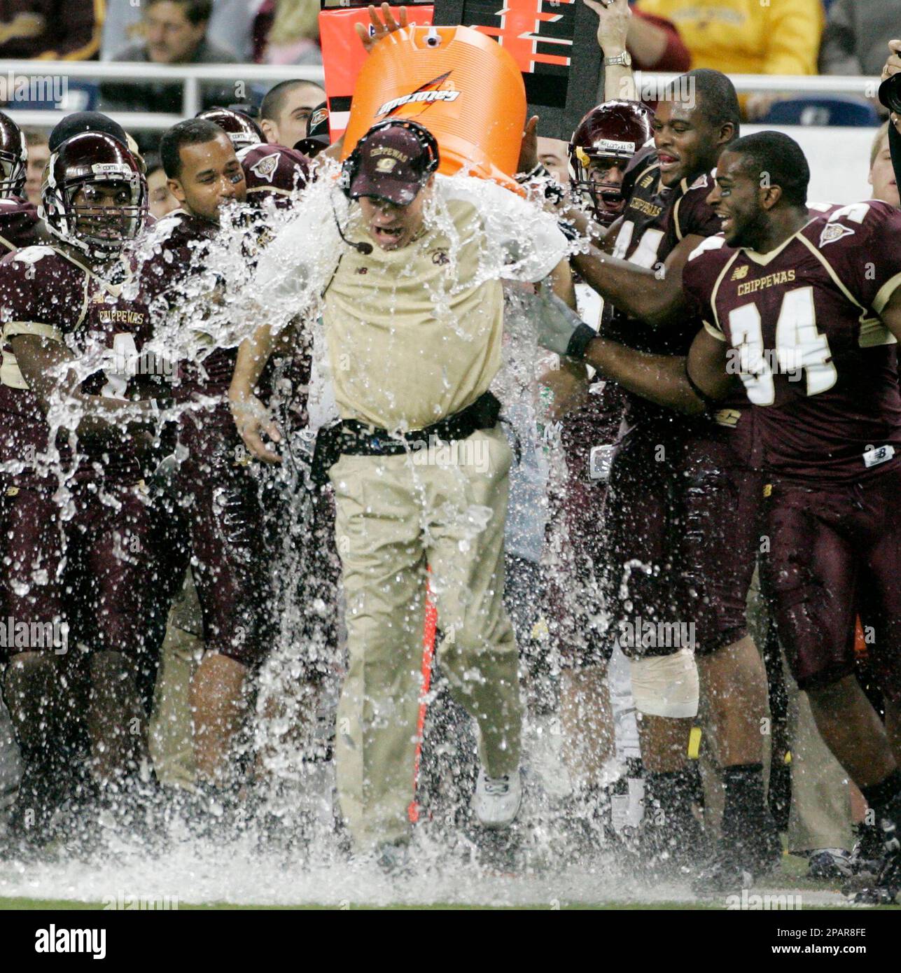 Central Michigan coach Butch Jones gets doused by his players, from ...