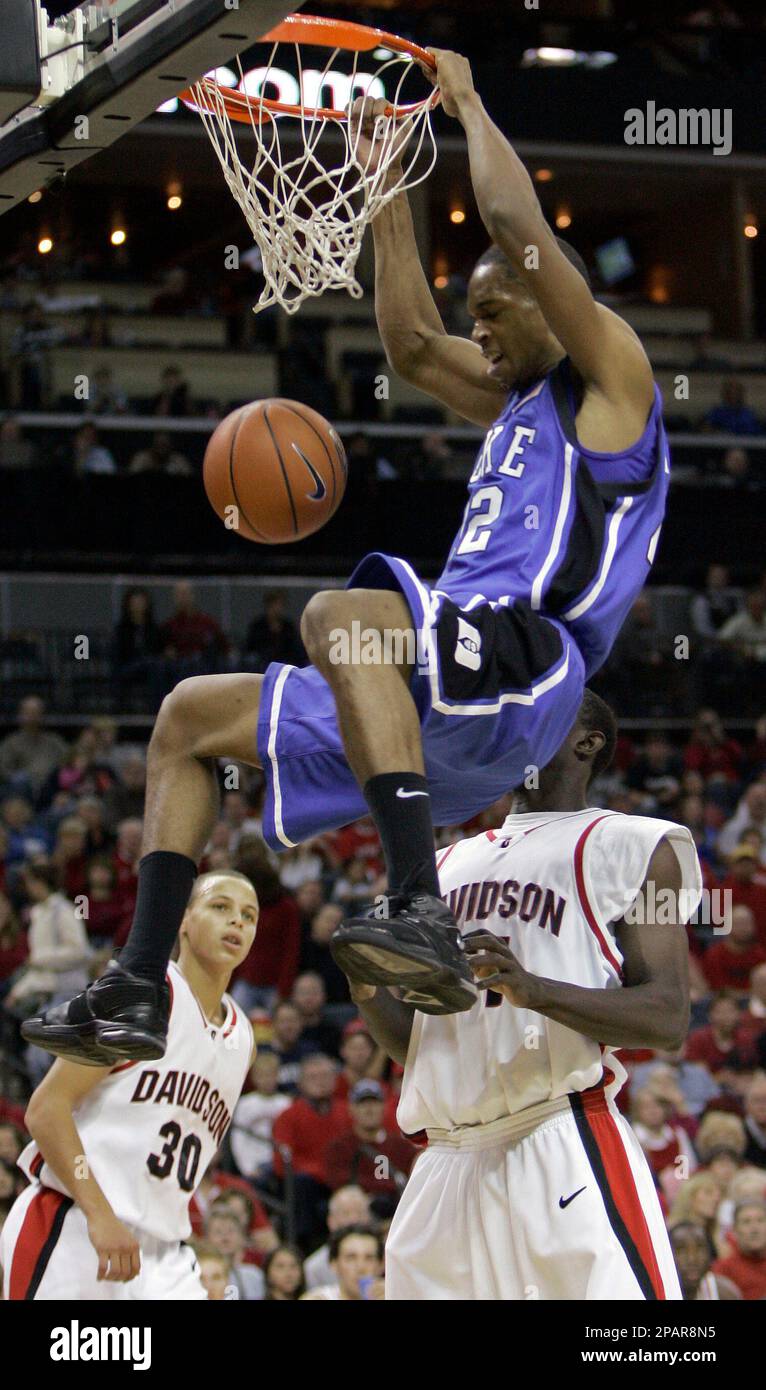 Duke's Lance Thomas (42) dunks as Davidson's Stephen Curry (30) and ...