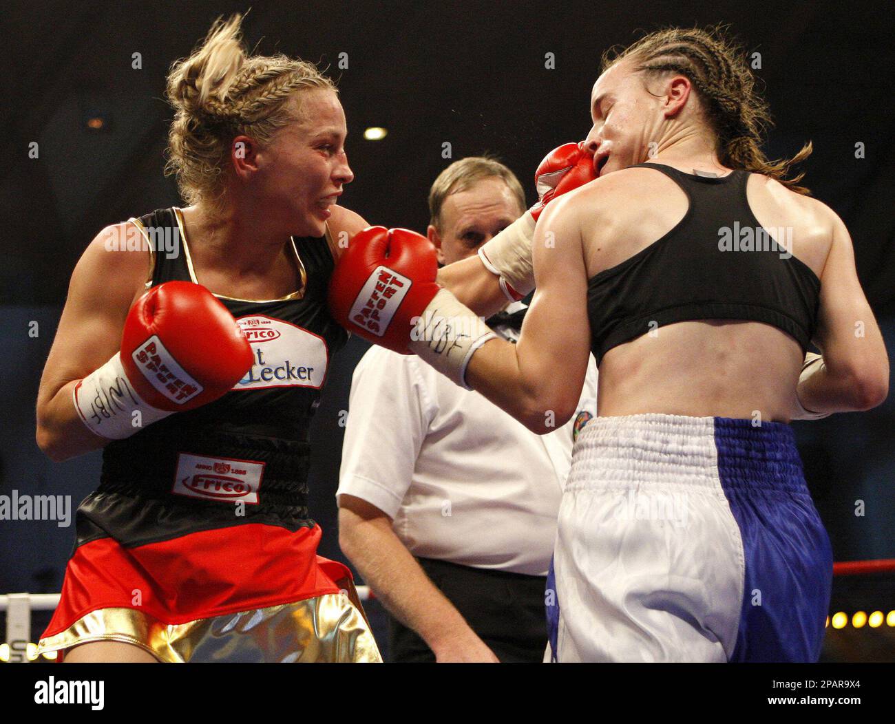 WIBF flyweight boxing world champion Regina Halmich from Germany, left ... WIBF flyweight boxing world champion Regina Halmich from Germany, left ...
