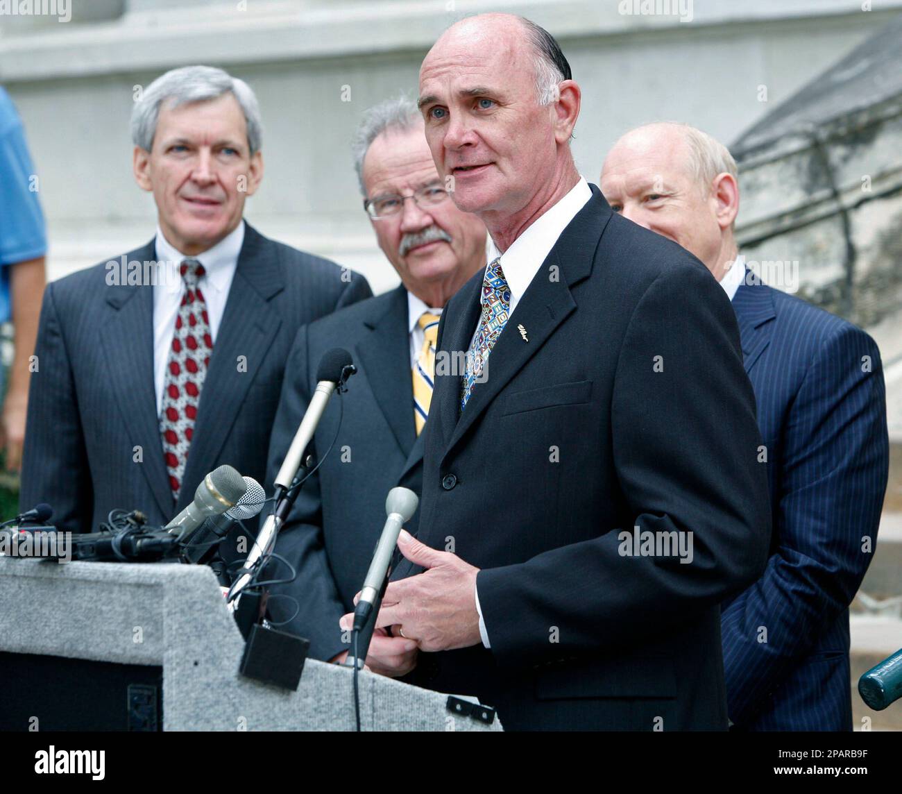 El Paso Mayor John Cook, at podium, joins with mayors Tome Leppert of ...