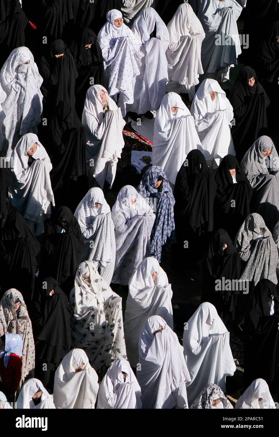 Iranian women make traditional Muslim Friday prayers at the Imam mosque ...