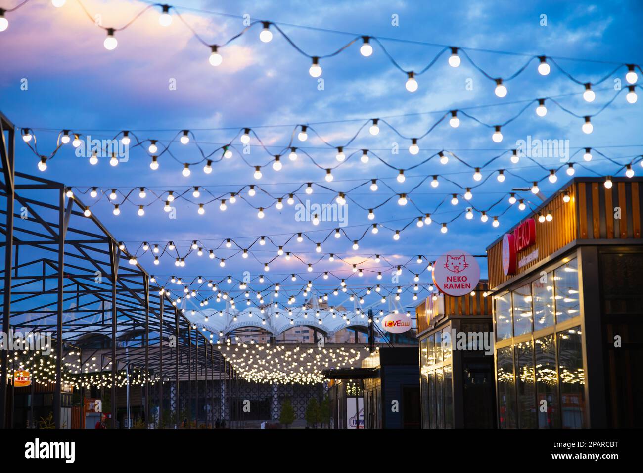 String of light bulb decorations, awning structures for outdoor ...