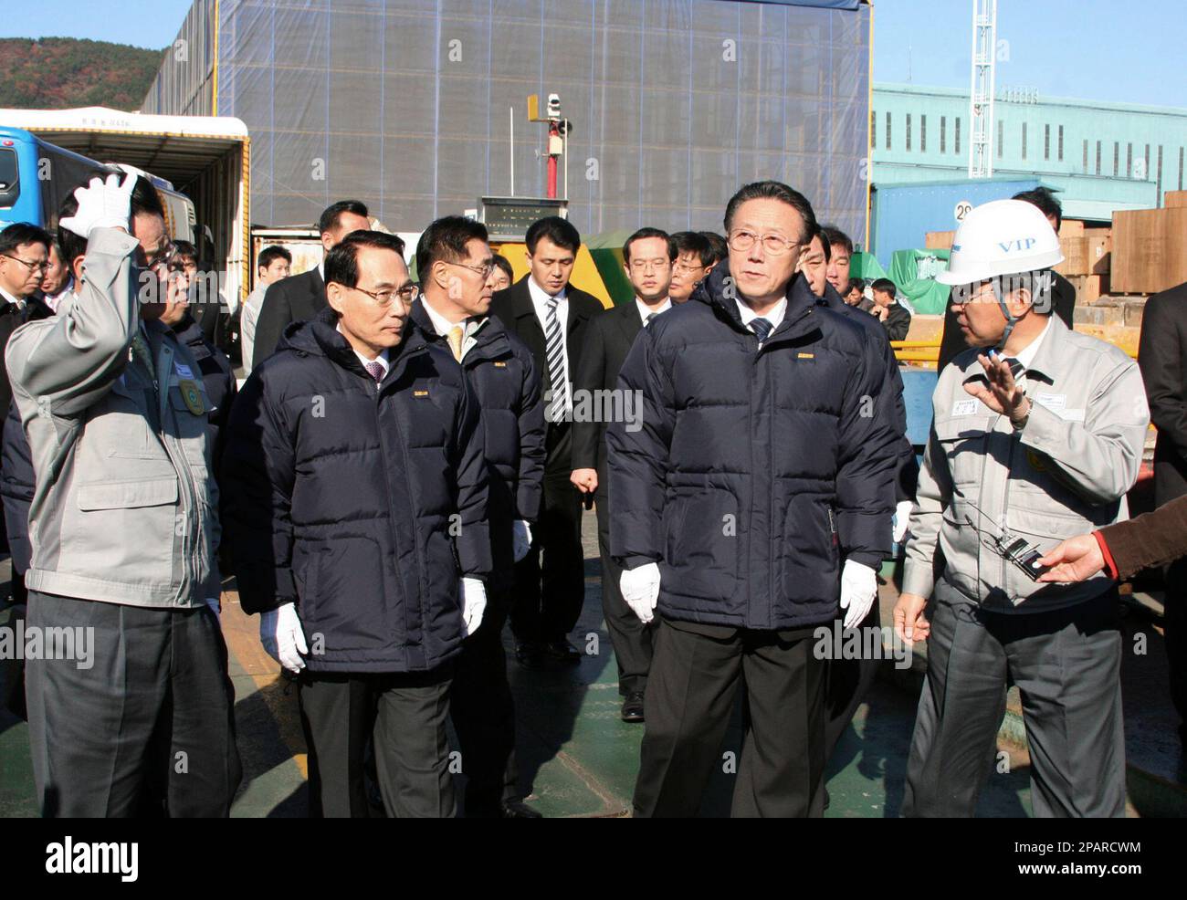 North Korean spy chief Kim Yang Gon, second from right, along with his ...