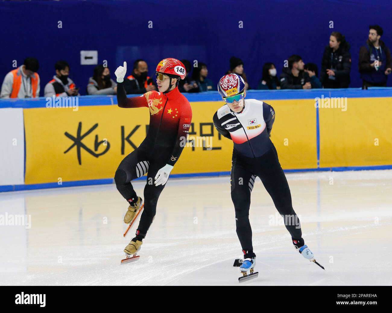 Seoul, South Korea. 12th Mar, 2023. Lin Xiaojun (L) of China reacts ...