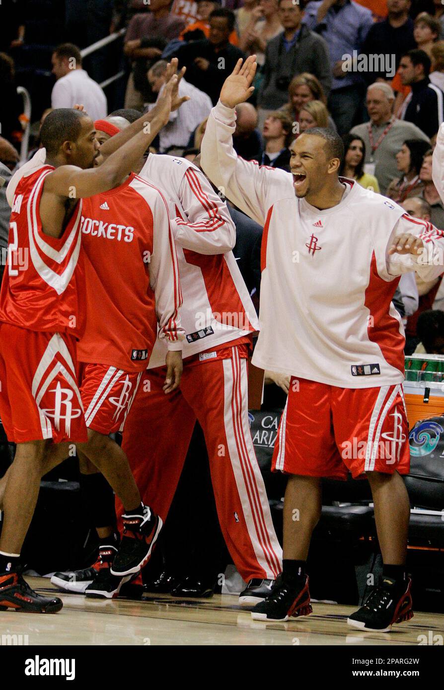 Houston Rockets' Rafer Alston, left, gets a high-five from teammate ...